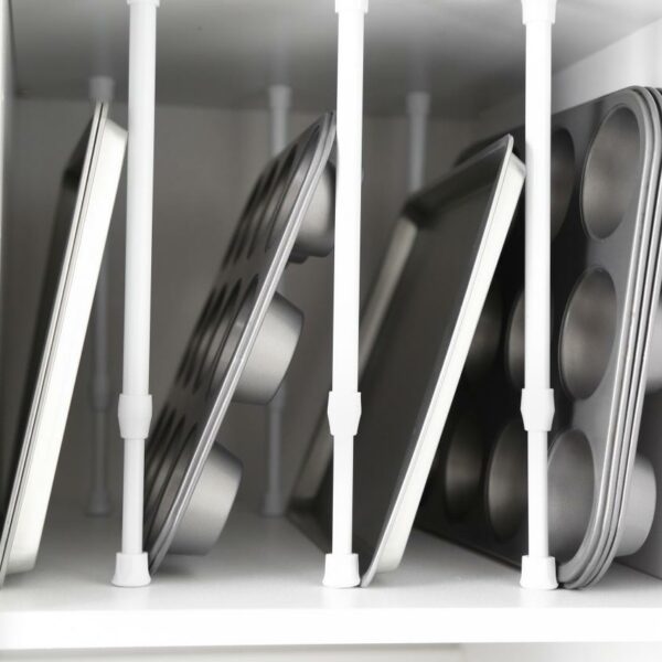 Tension rods to organize baking trays - StyleMag - Style Degree