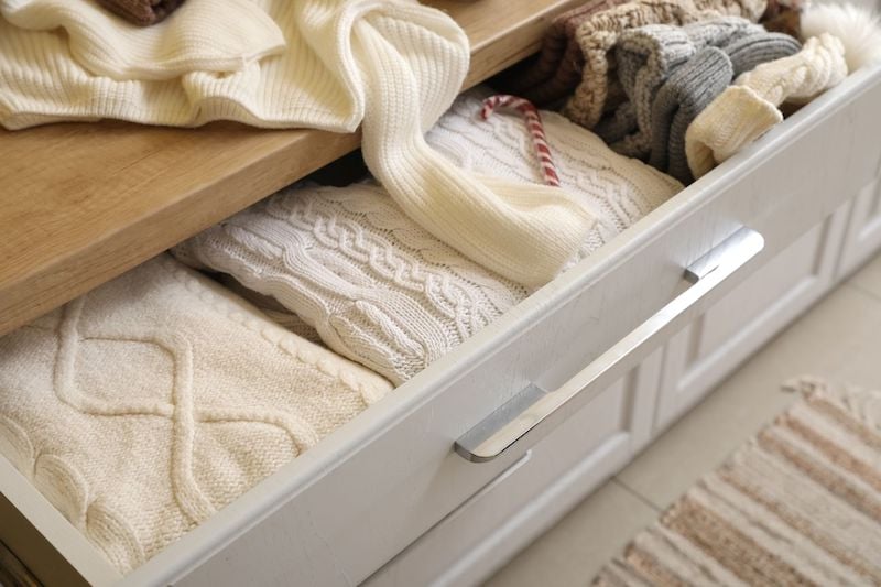 Guide To Folding & Storing Winter Clothes In Your HDB Home - Style Degree