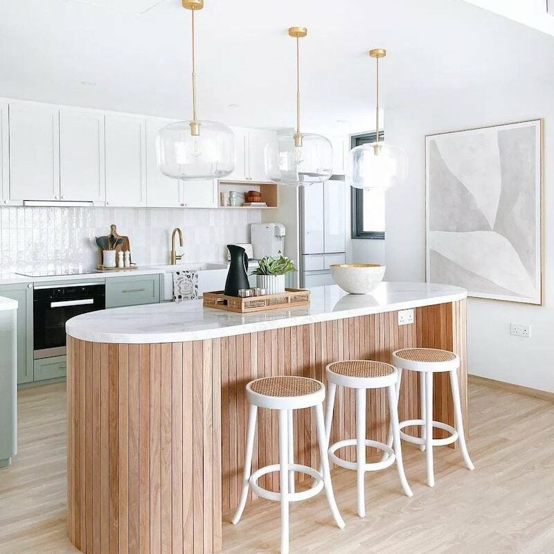 Rounded Kitchen Island With Bar Stools And Lights - StyleMag - Style Degree